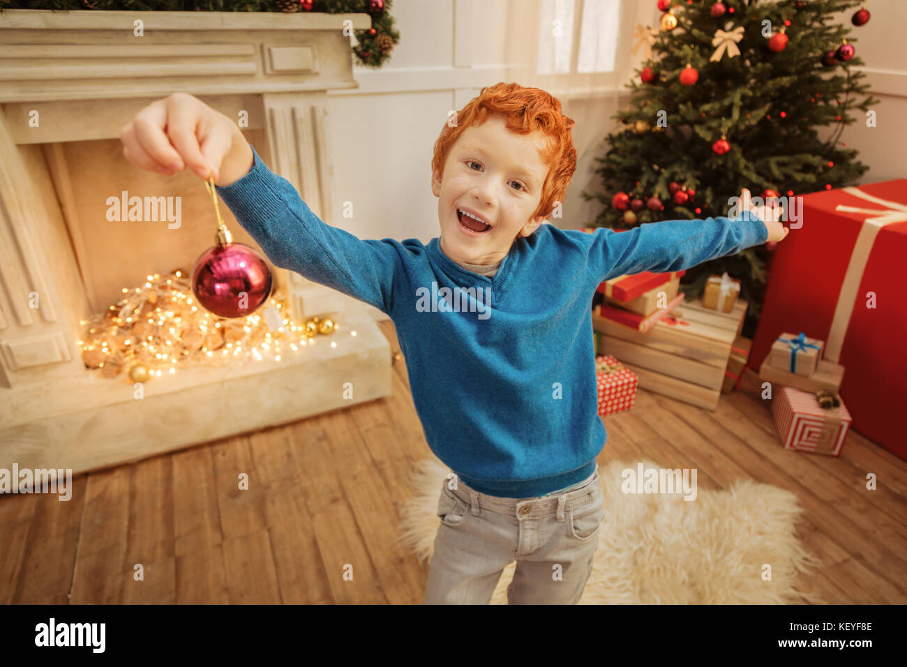 Happy redhead kid having fun and grinning broadly Stock Photo - Alamy