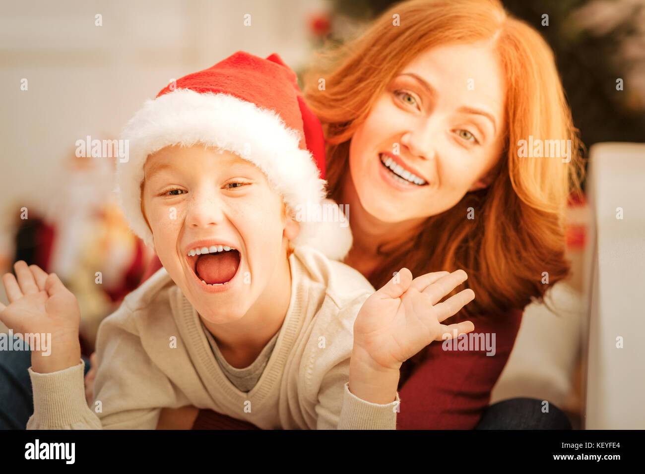 Extremely happy boy getting excited over christmas Stock Photo - Alamy