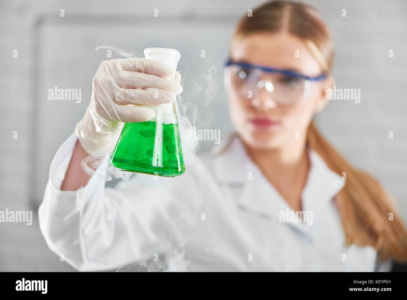 Female chemist working at the laboratory Stock Photo - Alamy