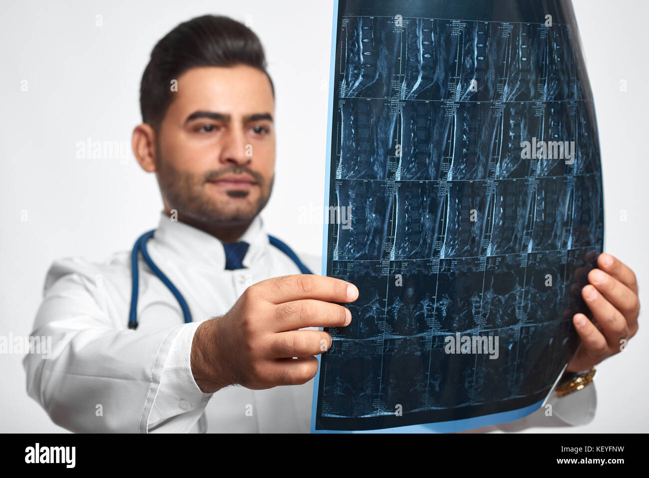 Male doctor posing at studio Stock Photo - Alamy