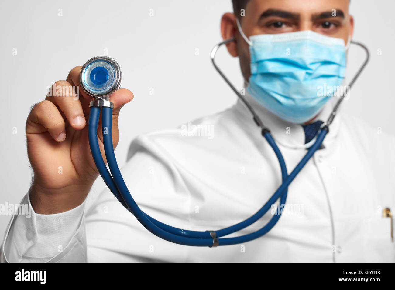 Male doctor posing at studio Stock Photo - Alamy