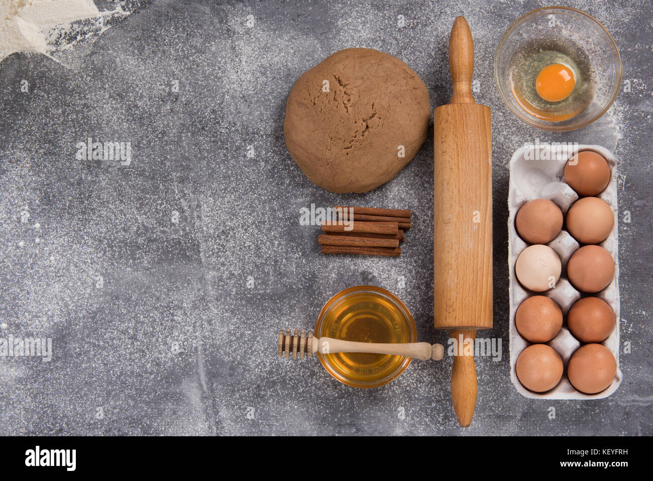 Baking utensils and ingredients on stone slate table Stock Photo - Alamy