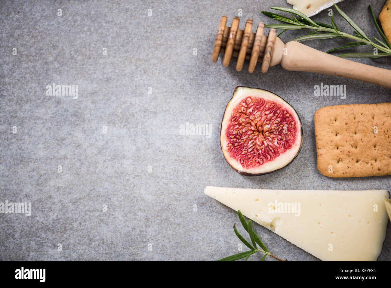 Cheese border background,mockup food frame. Overhead on stone slate ...