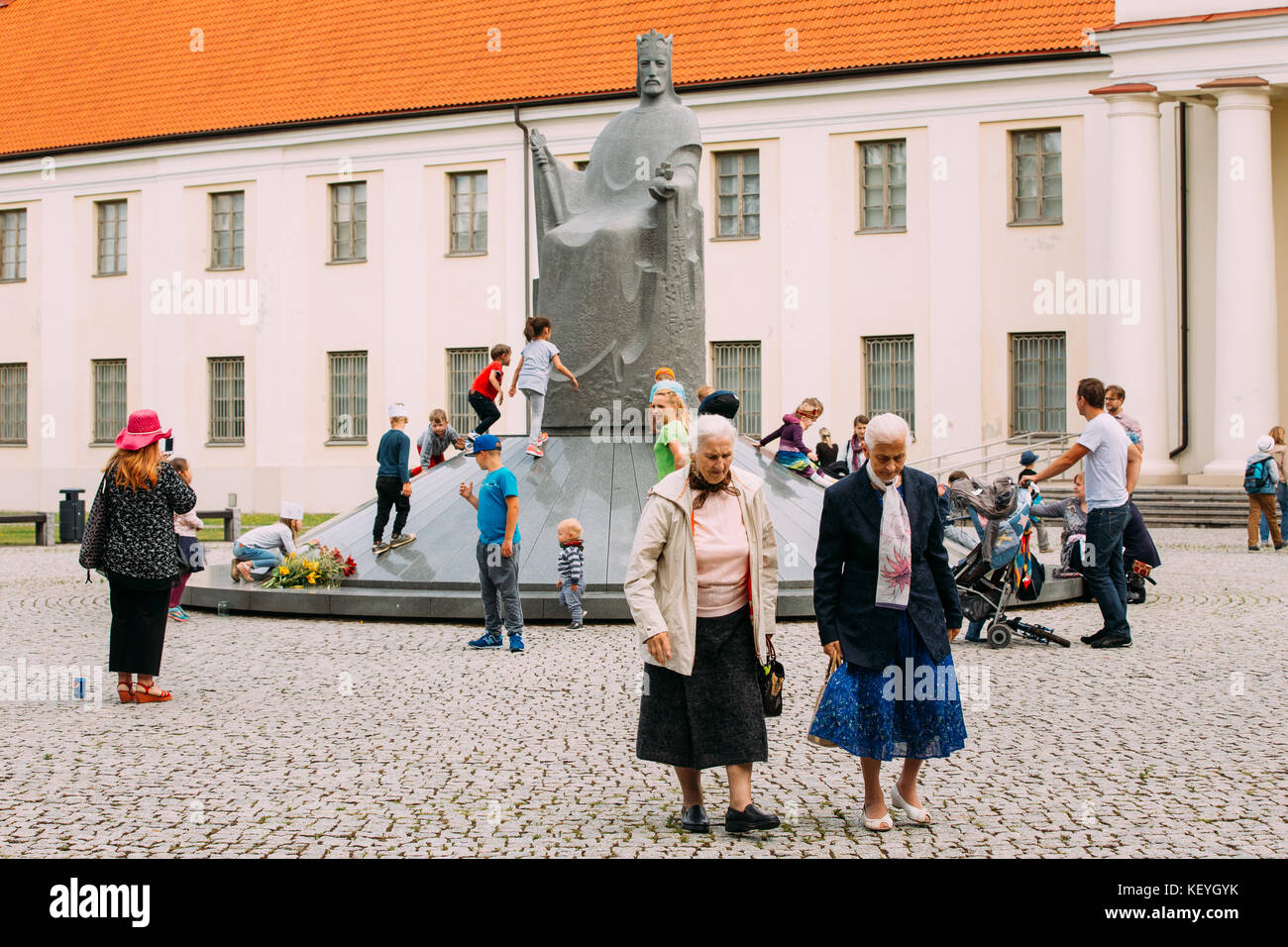 Vilnius, Lithuania. People Walking Near Monument To King Mindaugas Near ...