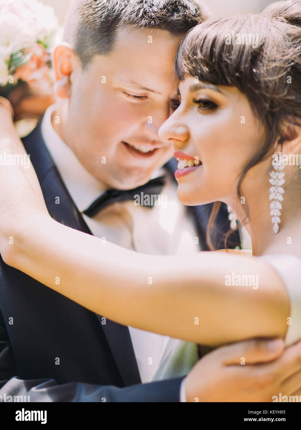 ROmantic portrait of the charming bride hugging groom Stock Photo - Alamy