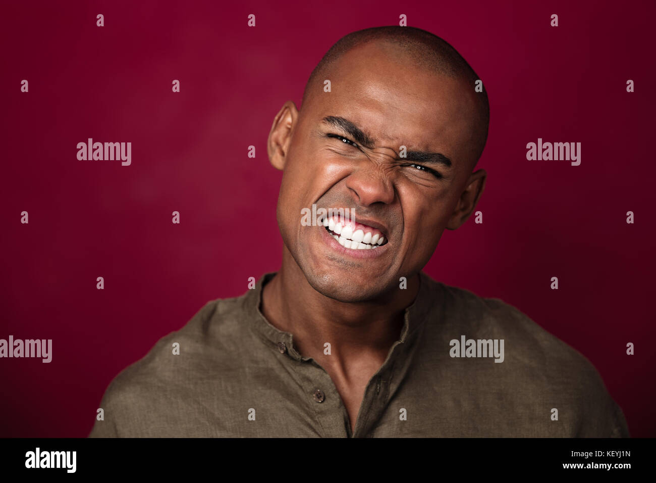 Angry man showing teeth hi-res stock photography and images - Alamy