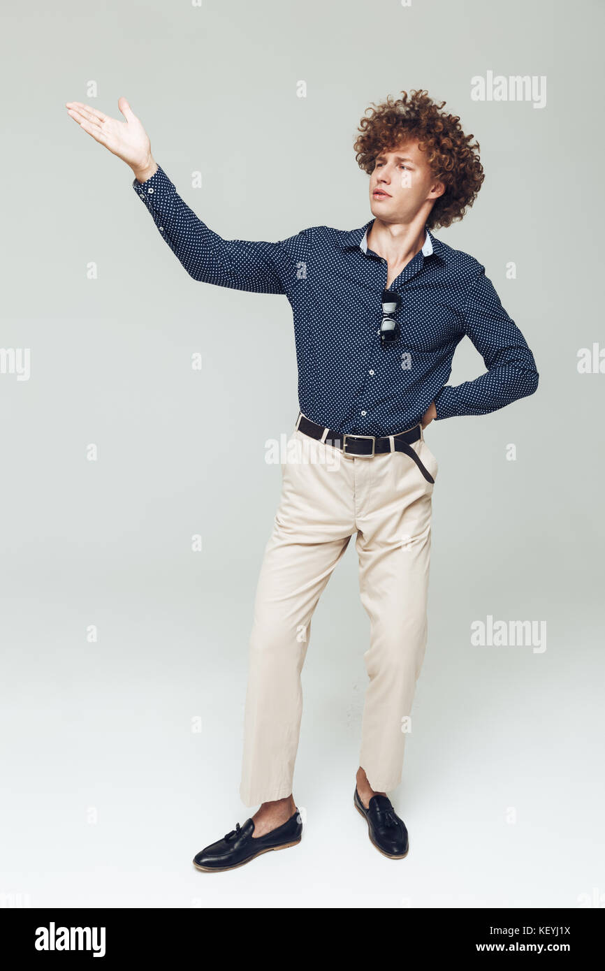 Image of handsome young retro stylish man dressed in shirt standing ...