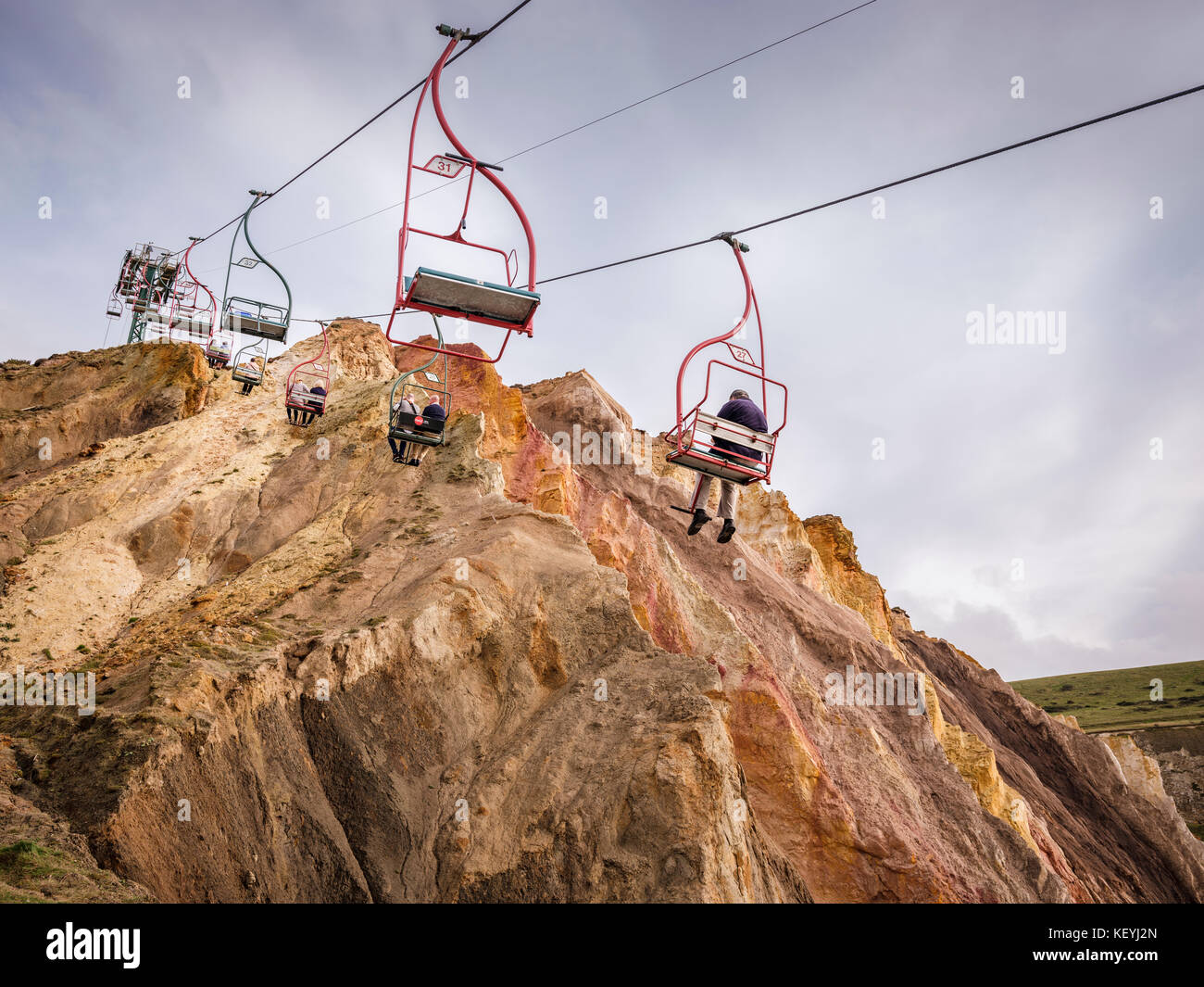 Chairlift with orange cable cars hi-res stock photography and images ...