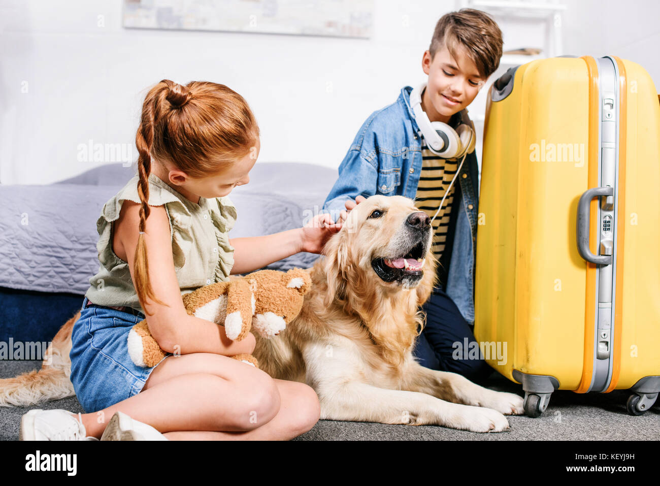 Female kids children dog hi-res stock photography and images - Alamy