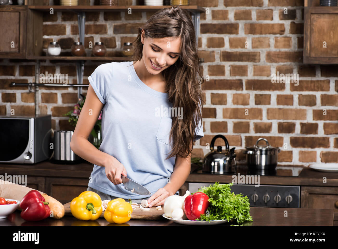 Cooking process beautiful woman hi-res stock photography and images - Alamy