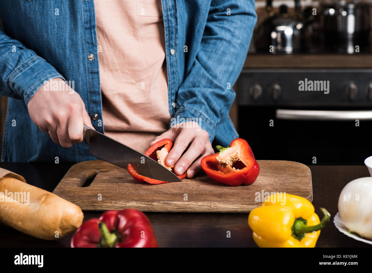 man cutting pepper Stock Photo - Alamy