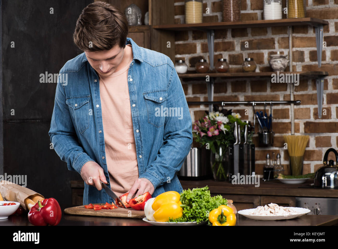 man cooking dinner Stock Photo - Alamy