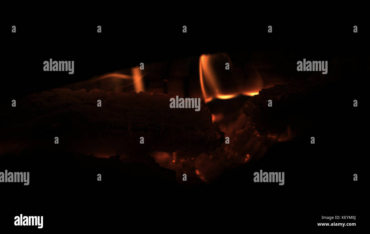 Burning wood smoldering wood smoldering log. Burning logs burned in the ...