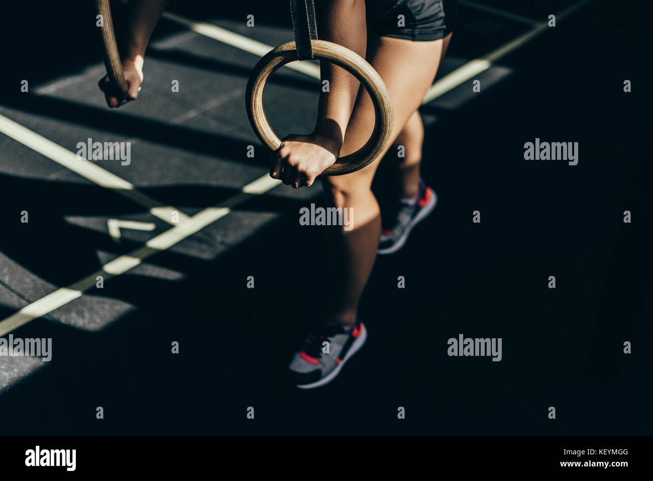 woman with gymnastic rings Stock Photo - Alamy