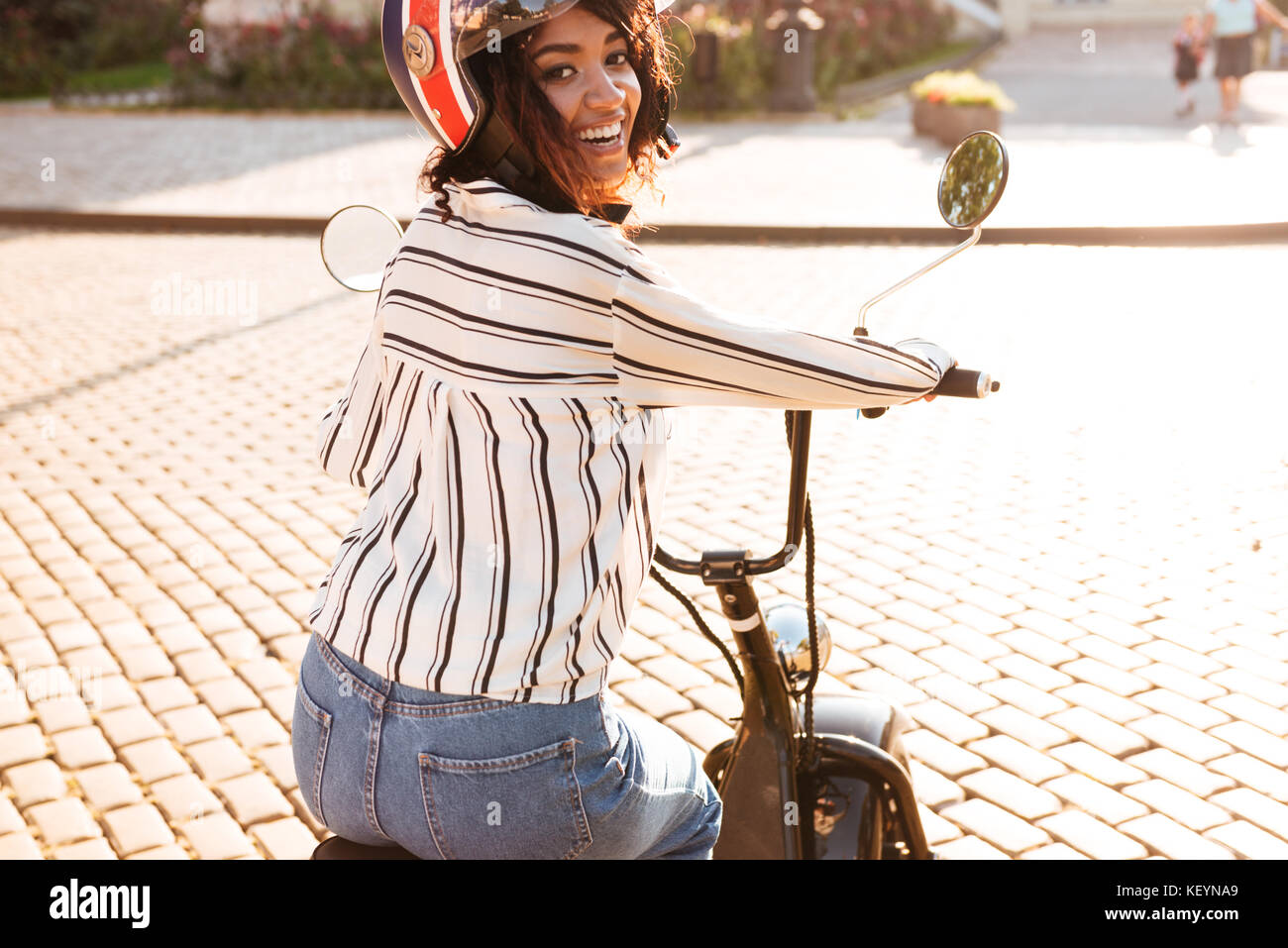 Girl on back of motorbike hi-res stock photography and images - Alamy
