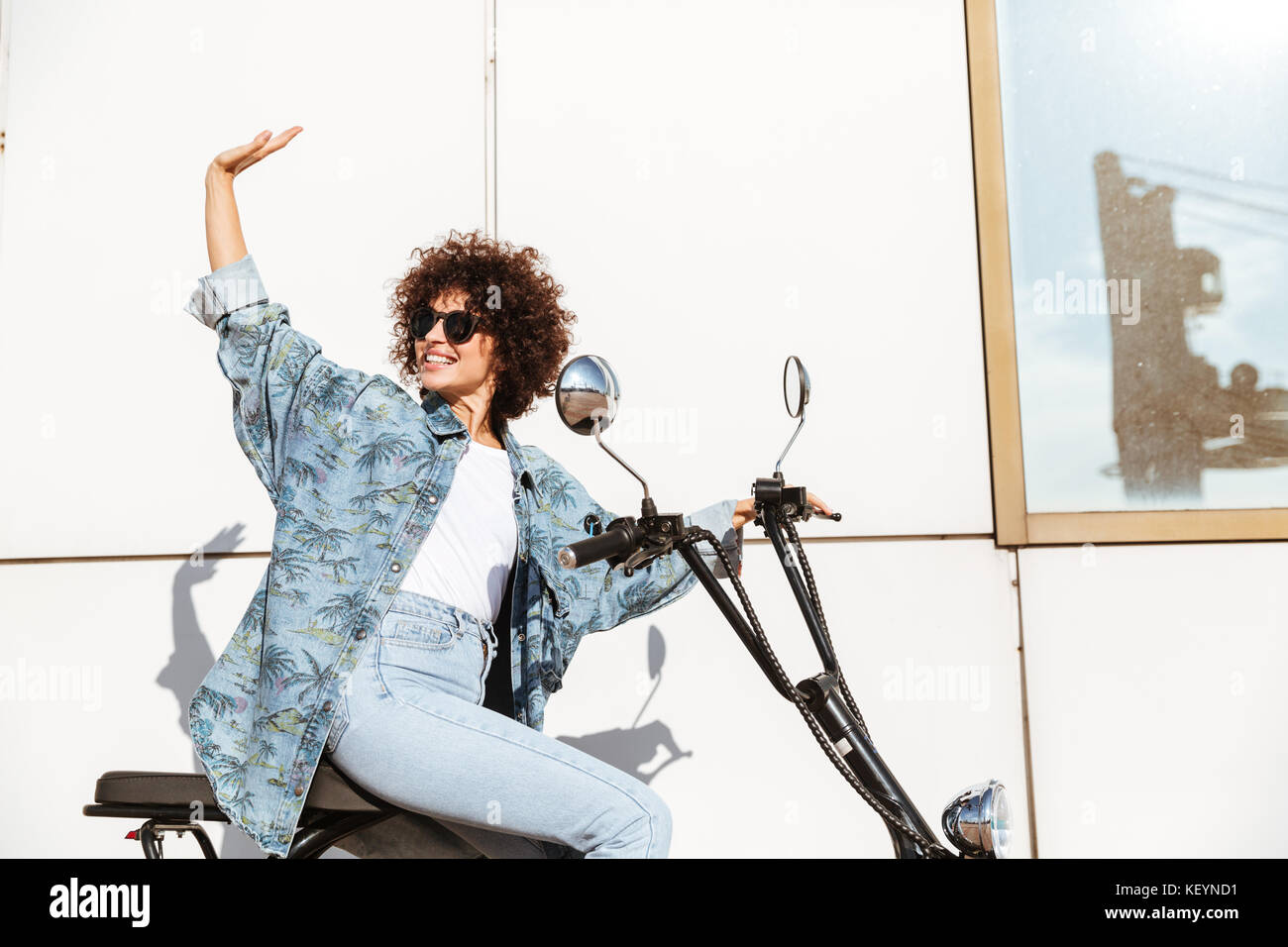 Waving biker hi-res stock photography and images - Alamy