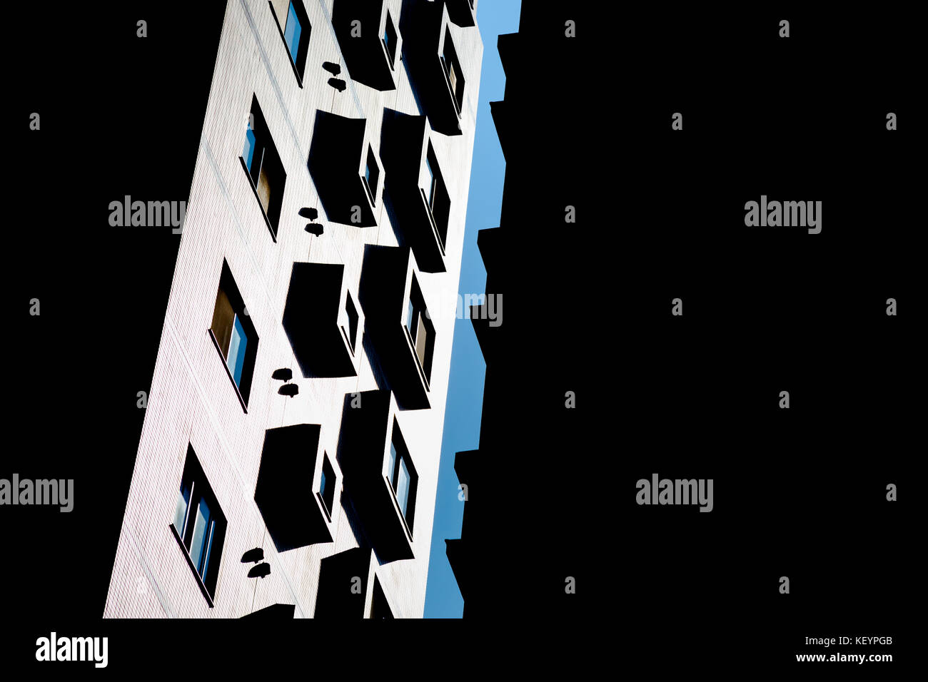 shadow of building and reflection of light on the building wall ...