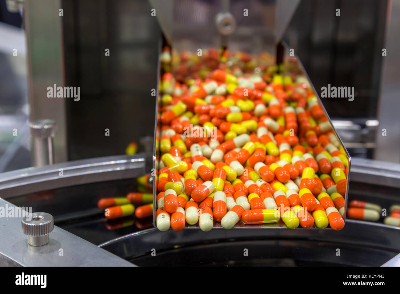 pharmacy medicine capsule pill in production line at medical factory ...