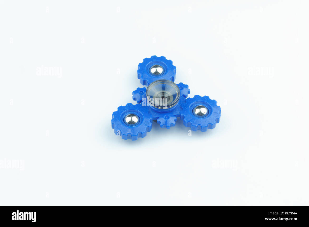 Blue color fidget finger spinner stress, anxiety relief toy Stock Photo ...