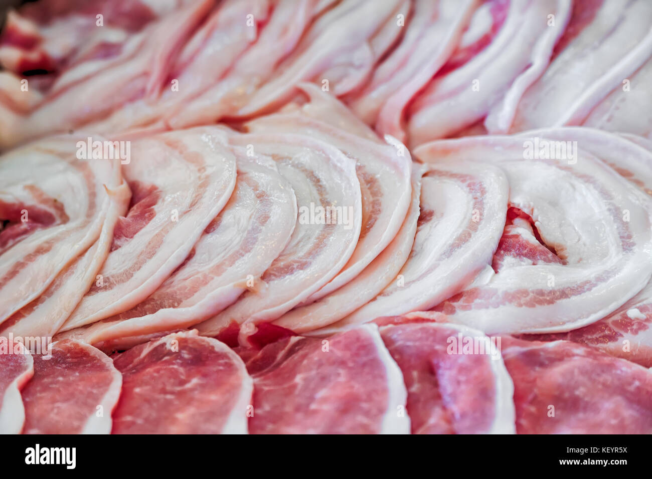 Close up of Slide raw streaky pork Stock Photo - Alamy