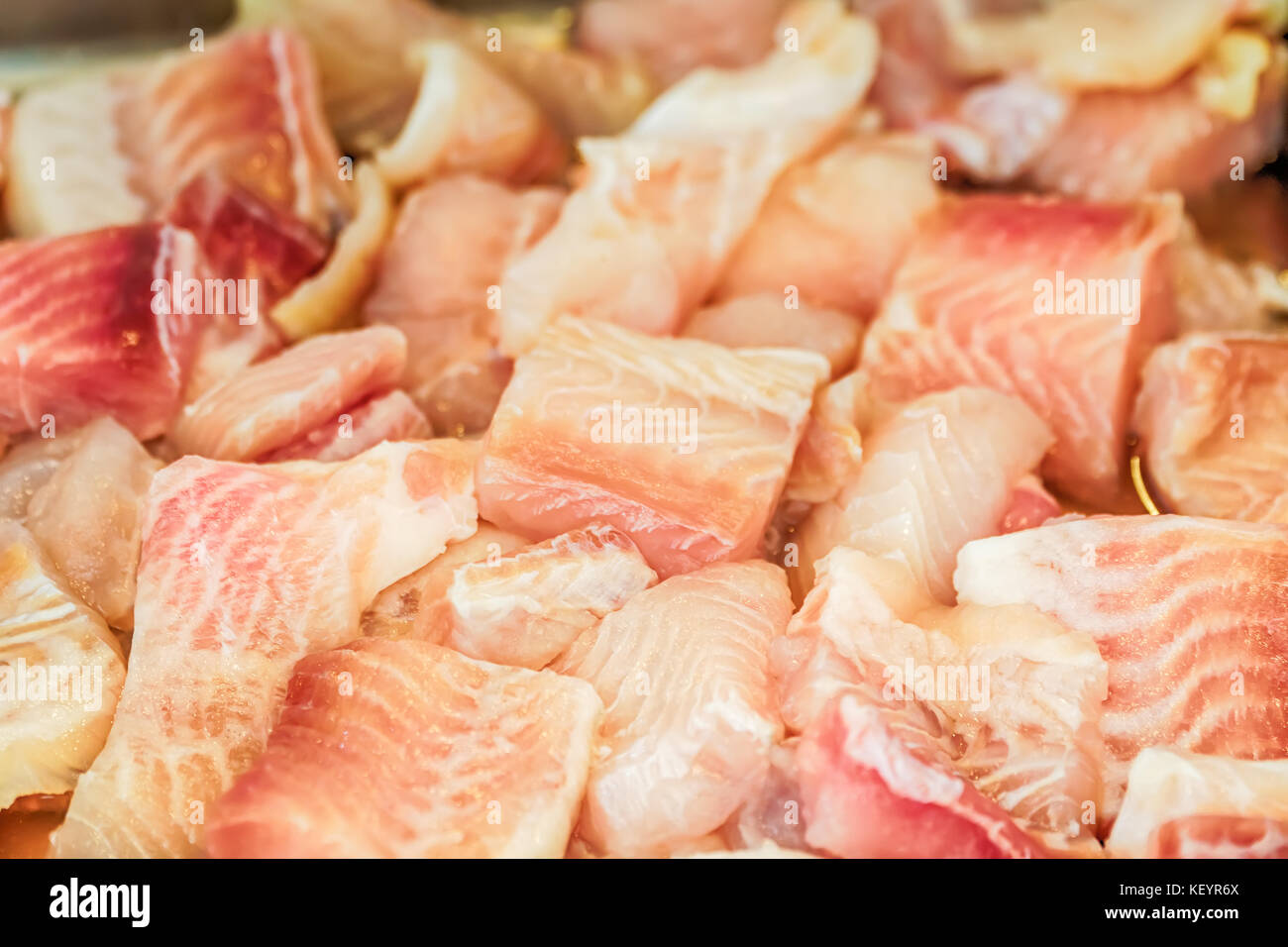 Fresh monkfish fillet on ice for sale at market Stock Photo - Alamy