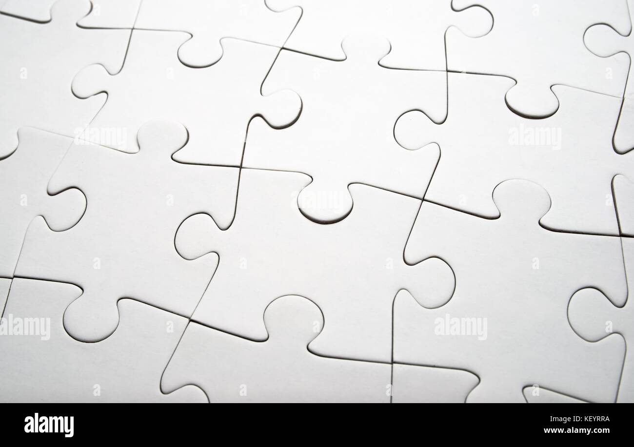 Close up of the pieces of a puzzle Stock Photo - Alamy
