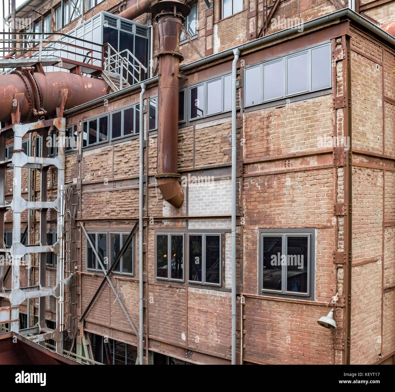 weathered rusty industrial building detail with old rundown, steel ...