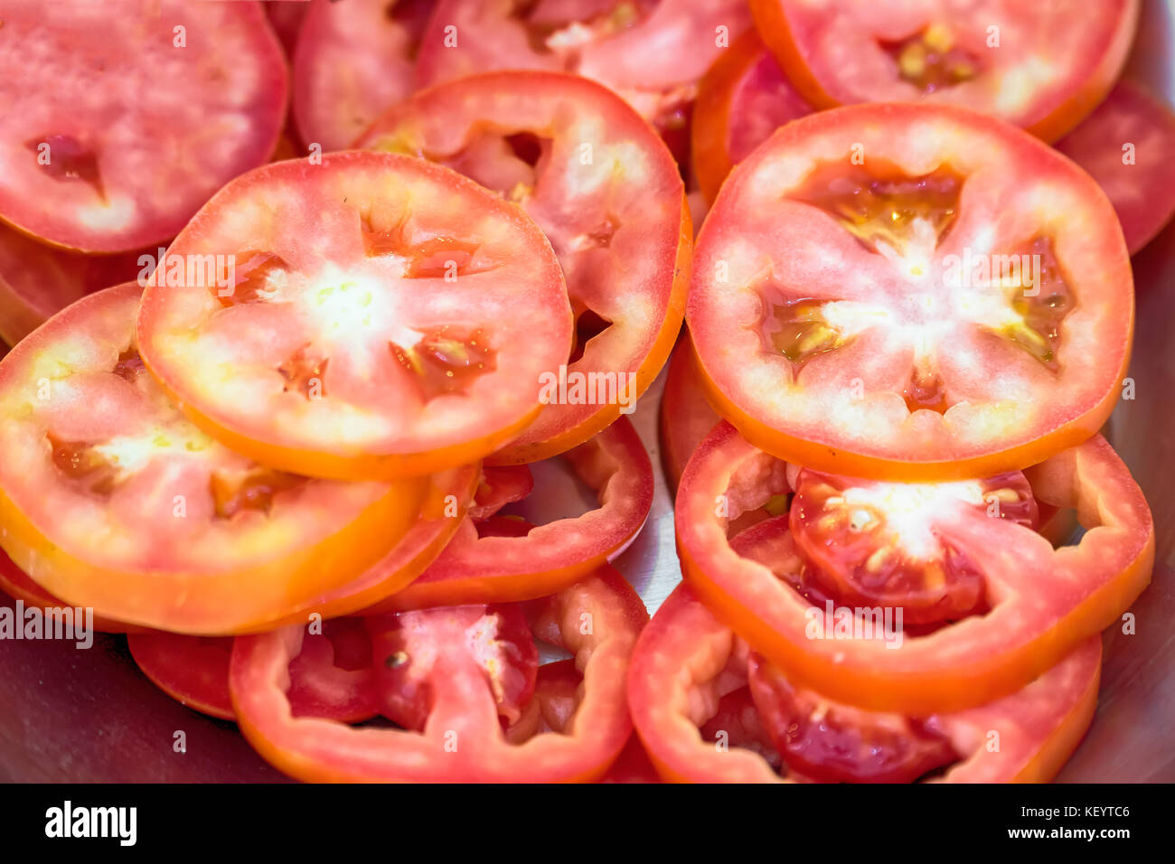 Tomatoes slice background Stock Photo - Alamy