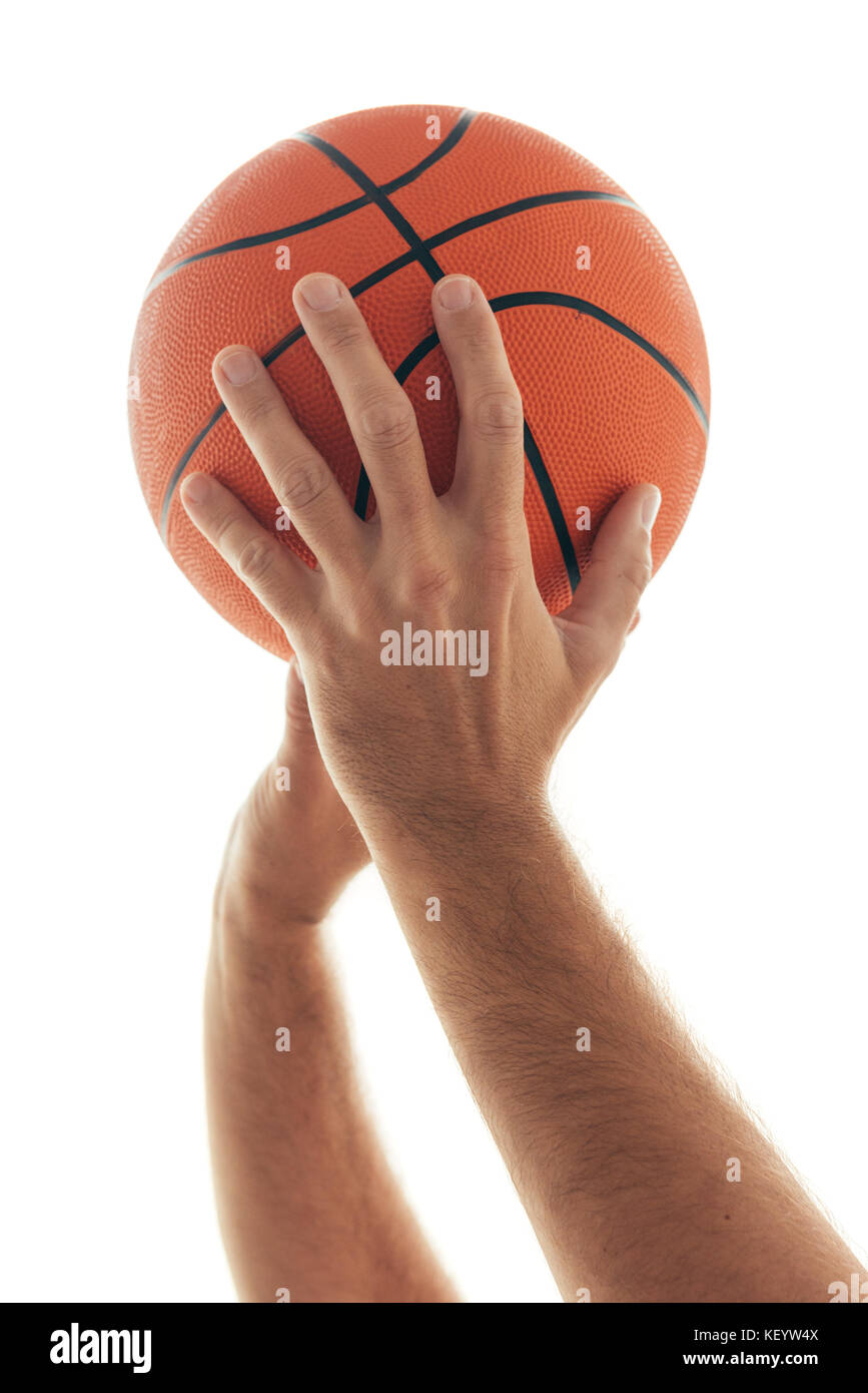 Male hand with basketball isolated on white background. Man holding ...