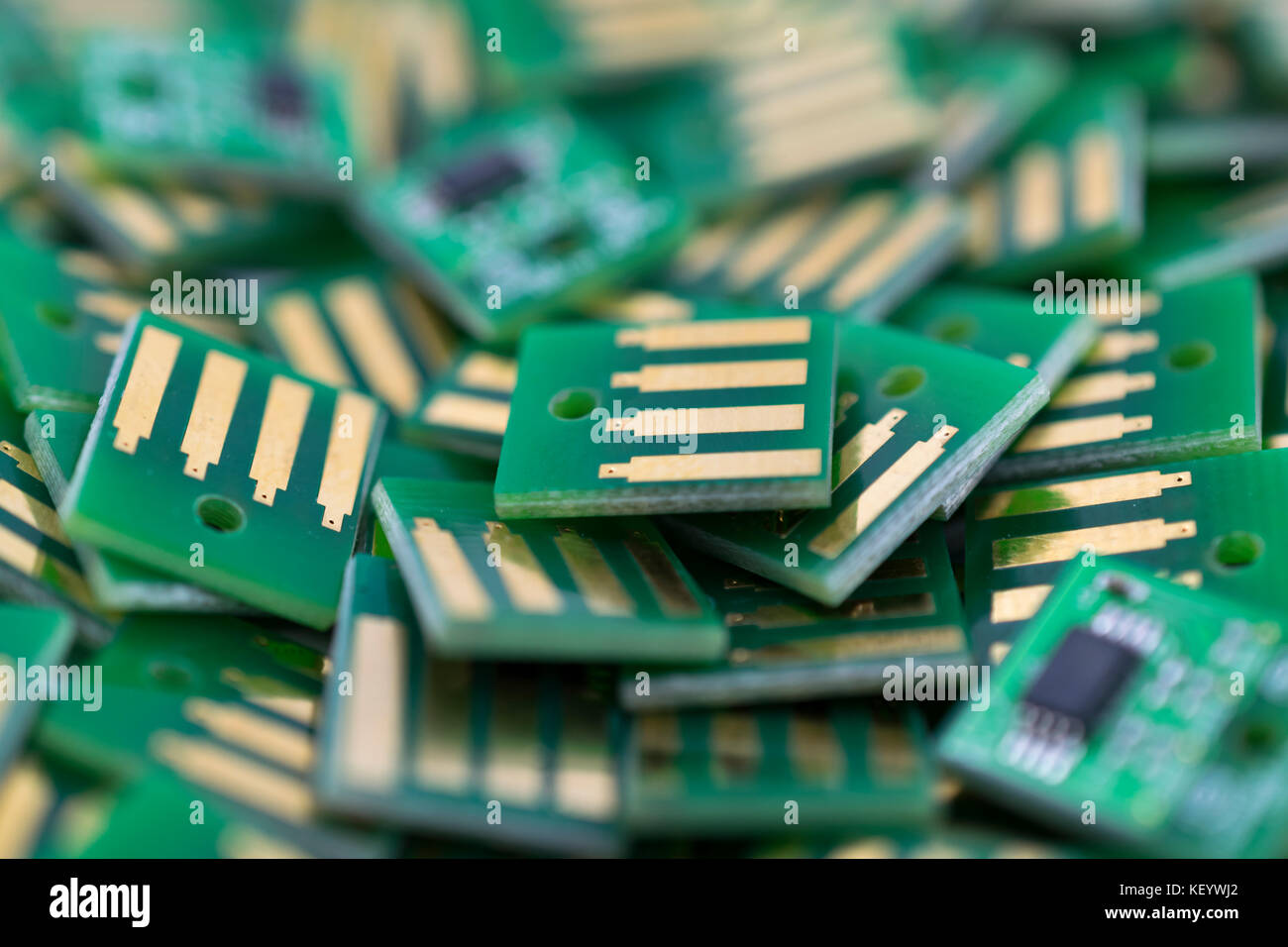 Pile of many green chips on white background Stock Photo - Alamy