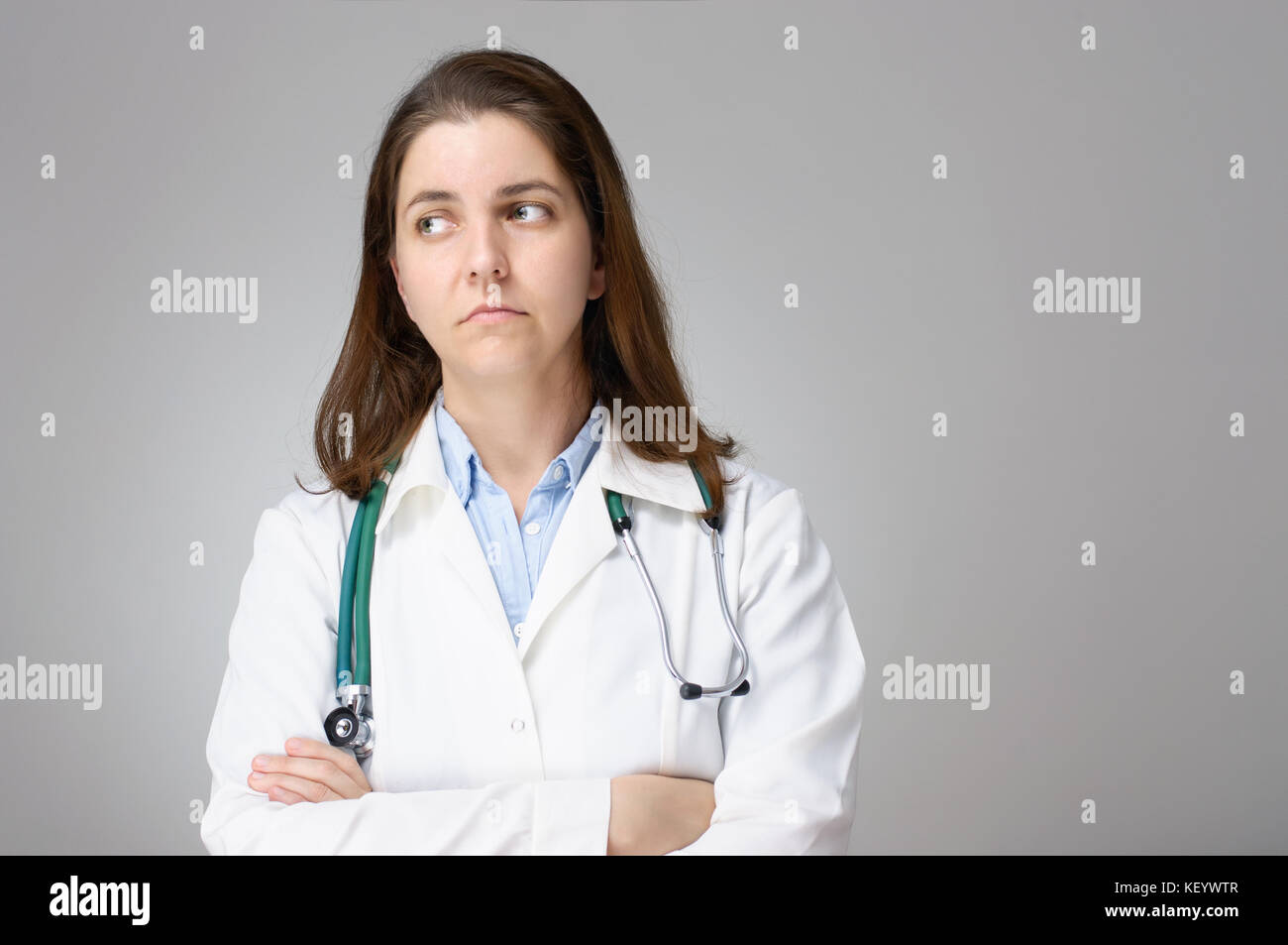 Portrait of a sad, disappointed female doctor Stock Photo - Alamy