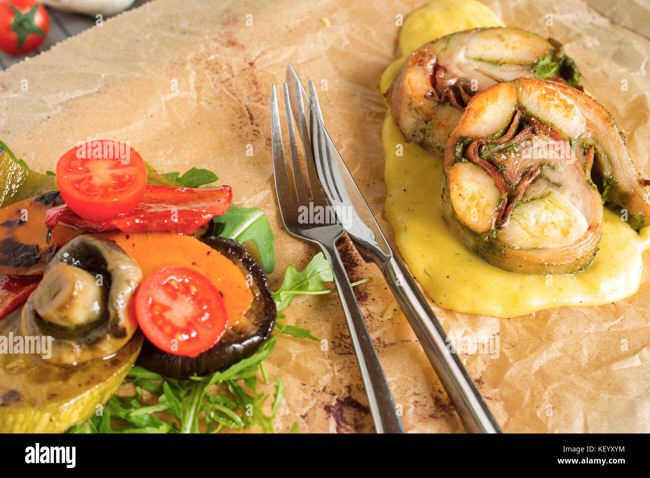 Roast rabbit meat with steamed vegetables and puree Stock Photo - Alamy