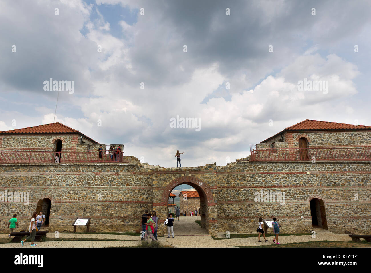BELCHIN, BULGARIA - SEPTEMBER 3, 2016: Tourists walks arround partly ...