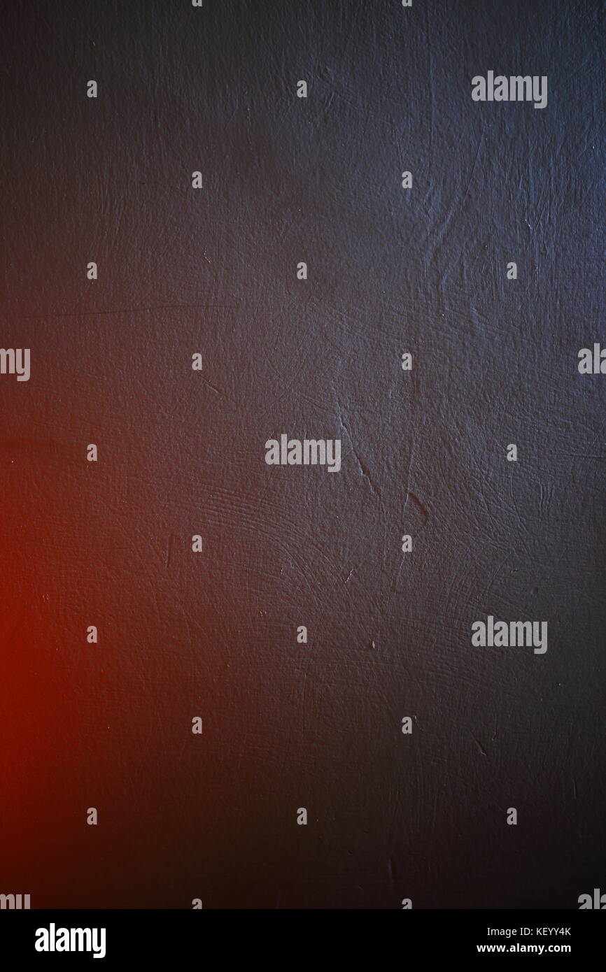 Textured stucco wall close up in colorful light Stock Photo - Alamy