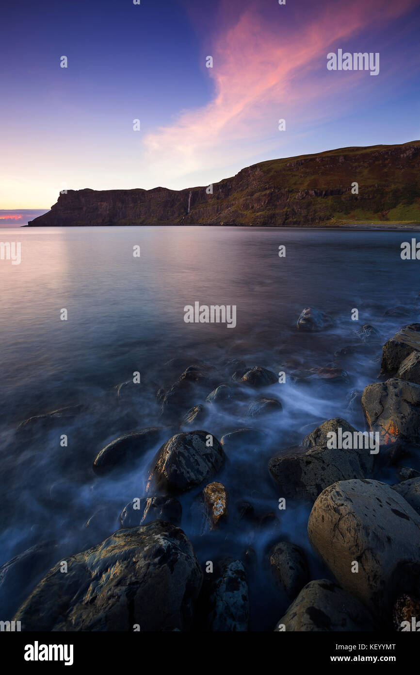 Sunset image at Talisker Bay on the Isle of Skye looking out to cliffs ...