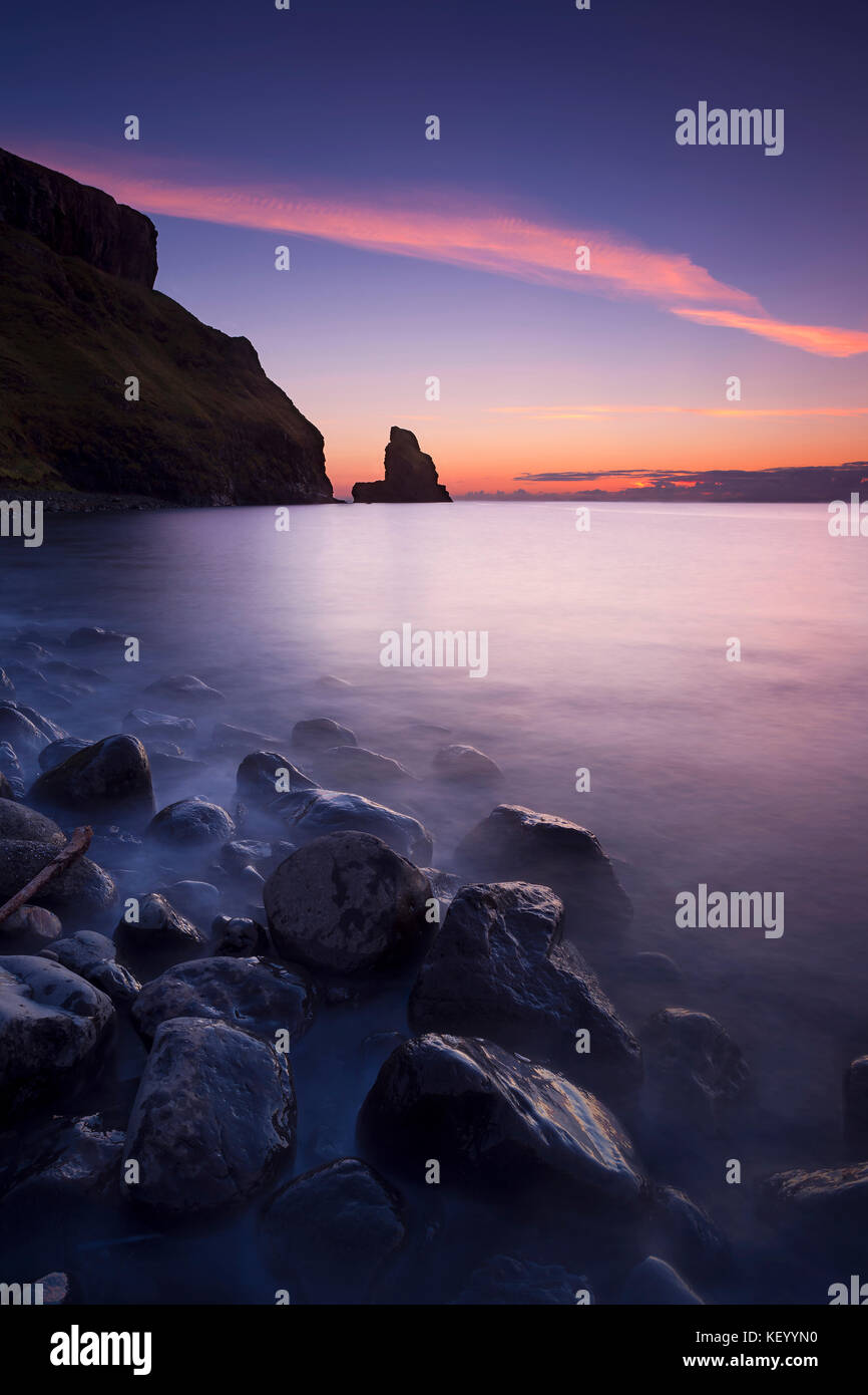 Sunset image at Talisker Bay on the Isle of Skye looking out to cliffs ...