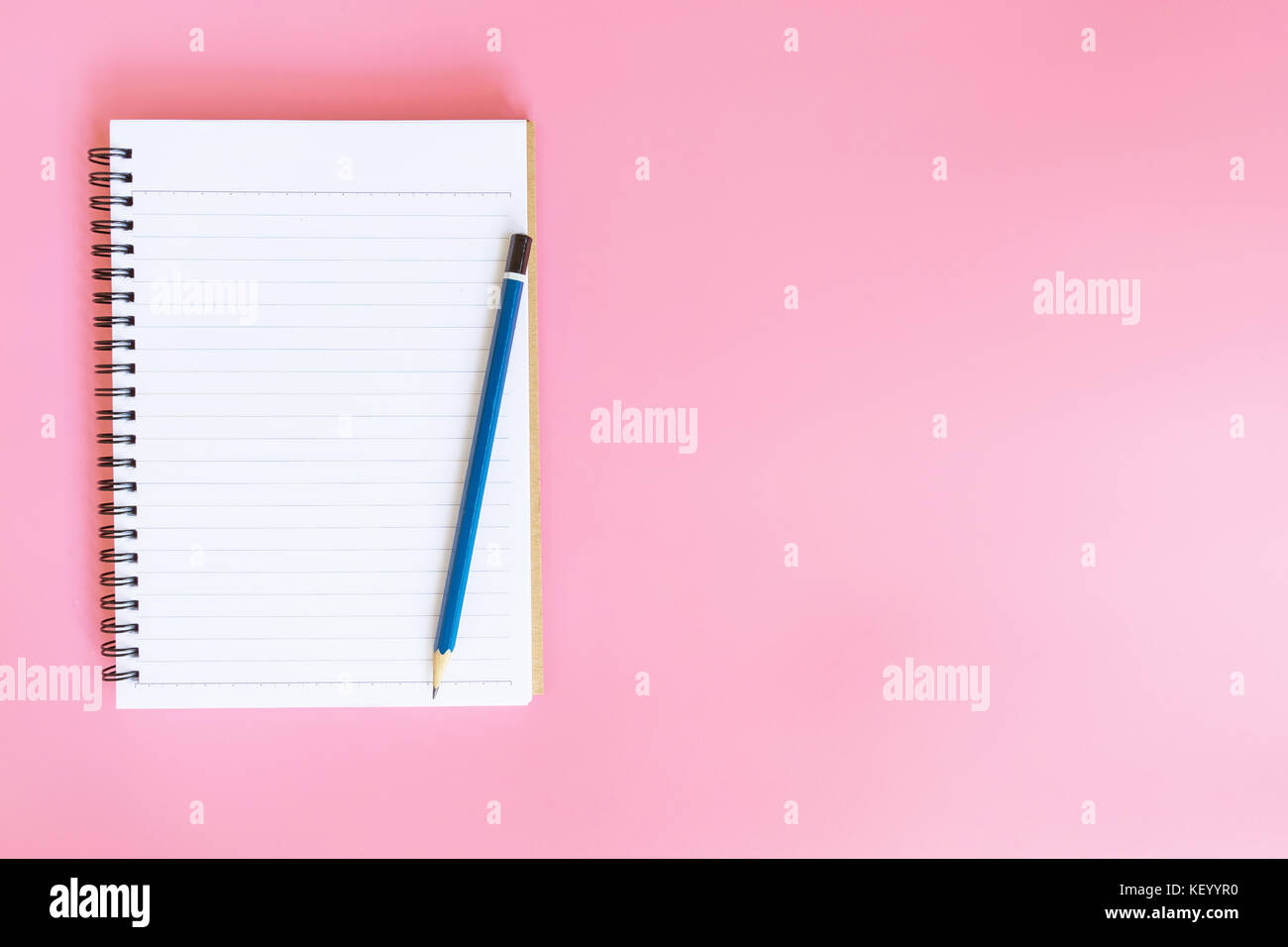 top view notebook paper on pink pastel color with space Stock Photo - Alamy