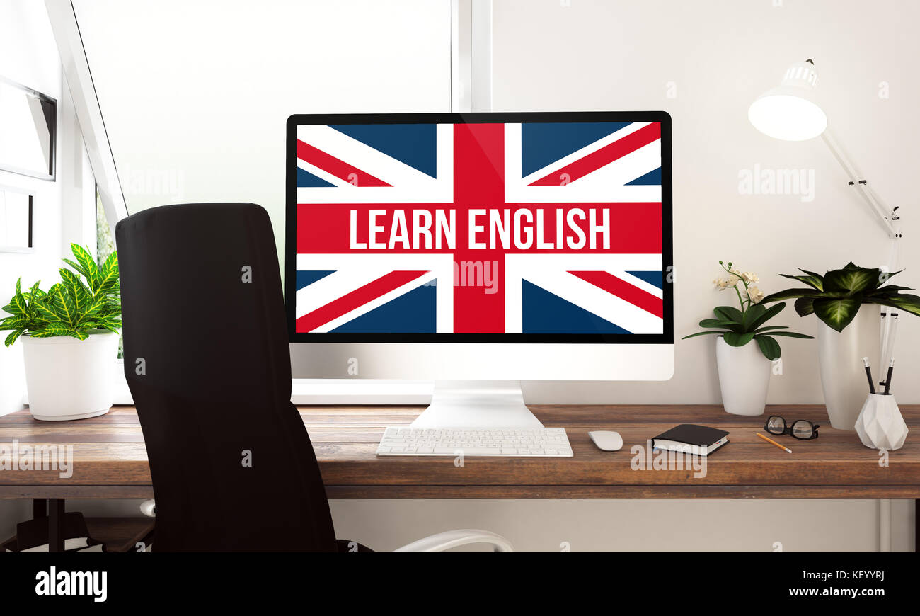 Computer with learn english on table 3d rendering Stock Photo - Alamy
