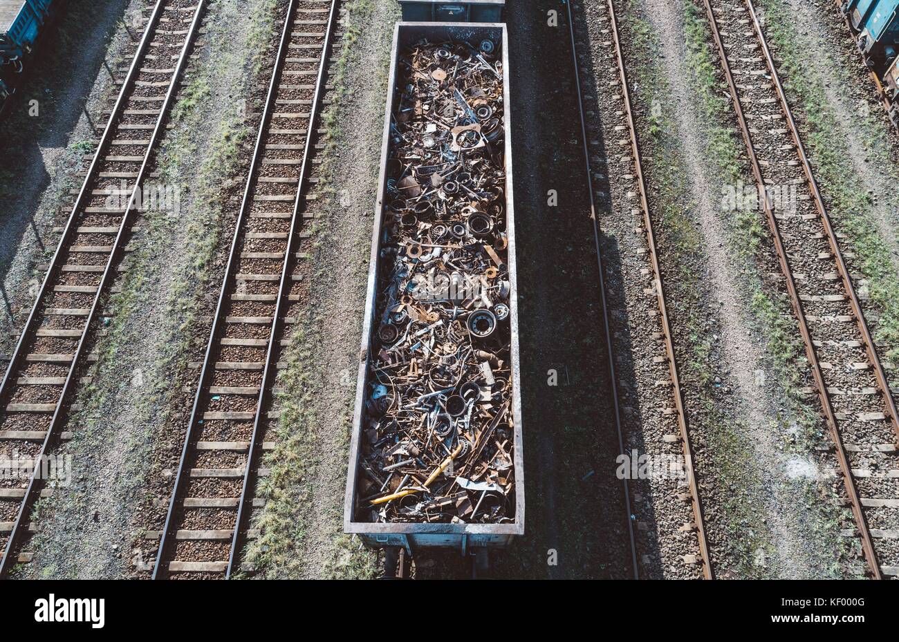 Drone above view on railway wagon filled with scrap metal. Metal ...