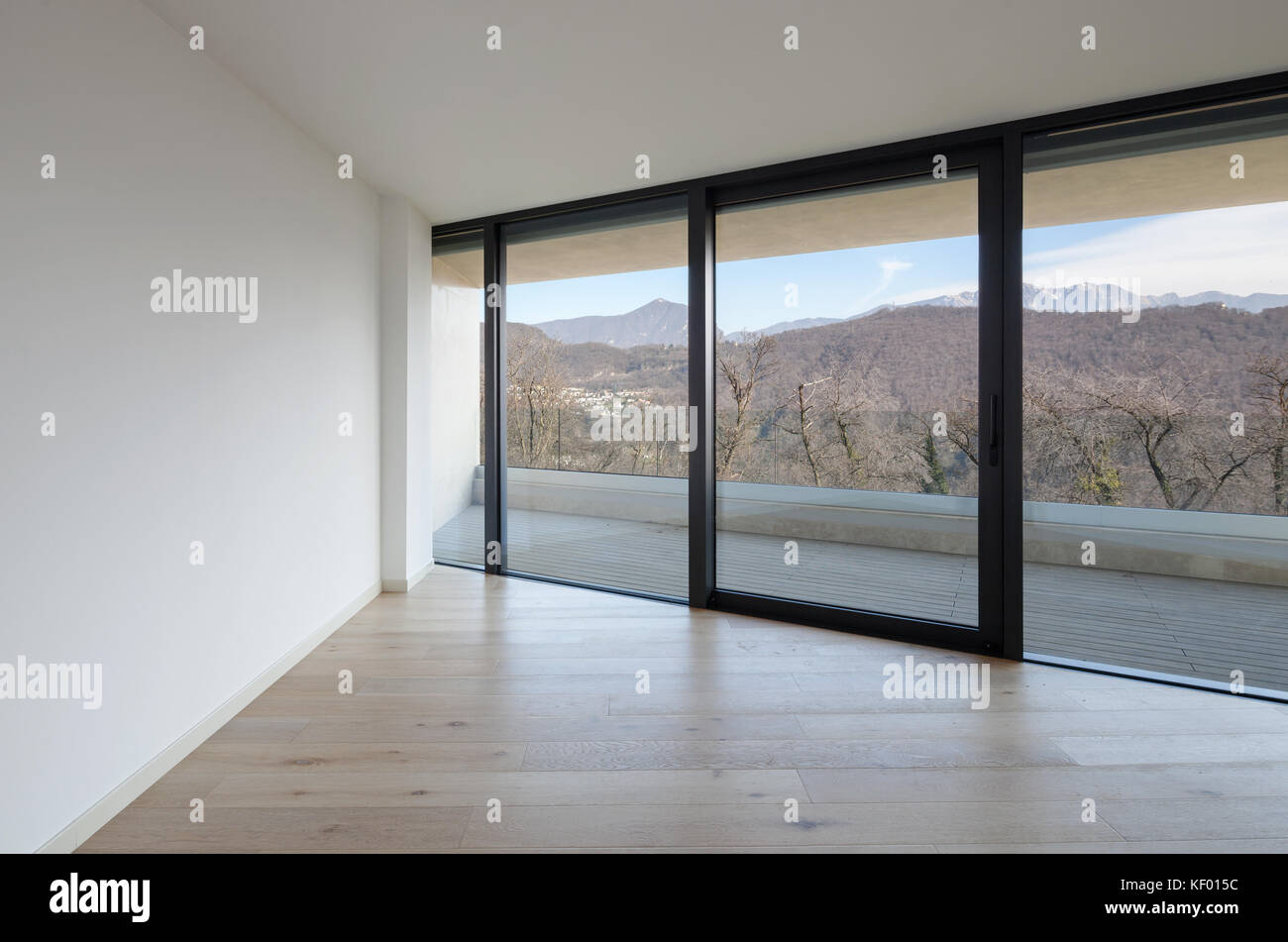 Big windows of a modern empty room Stock Photo - Alamy