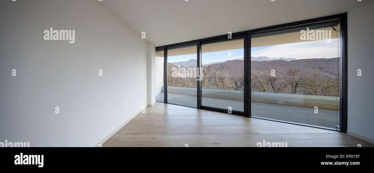 Big windows of a modern empty room Stock Photo - Alamy