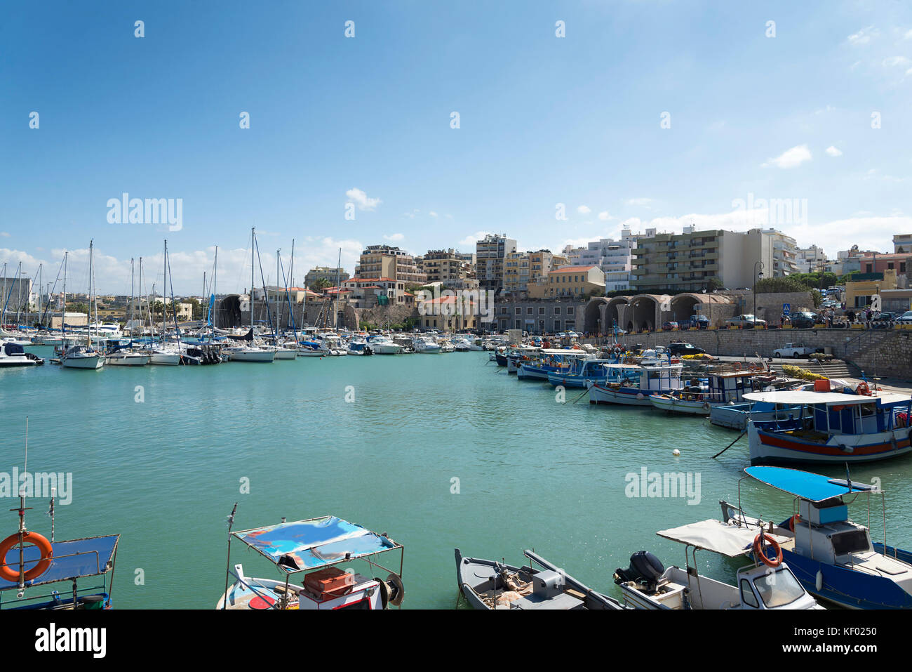 Boats and yachts on the dock in Greece on the island of Crete Stock ...