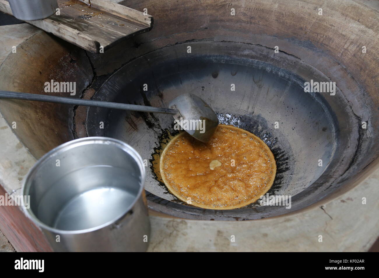 Boiling the sugar cane juice hi-res stock photography and images - Alamy