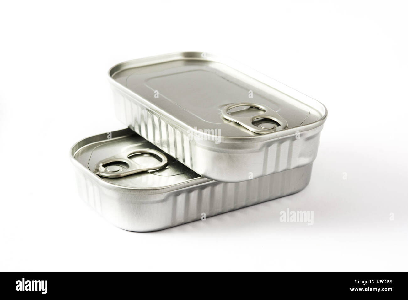 Closed cans of preserves isolated on white background Stock Photo - Alamy