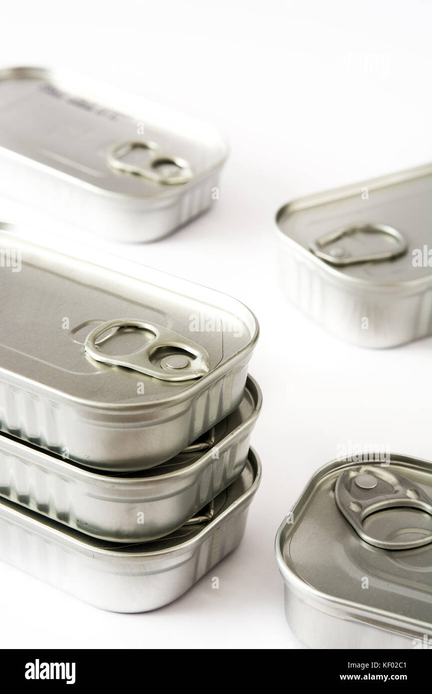 Closed cans of preserves isolated on white background Stock Photo - Alamy