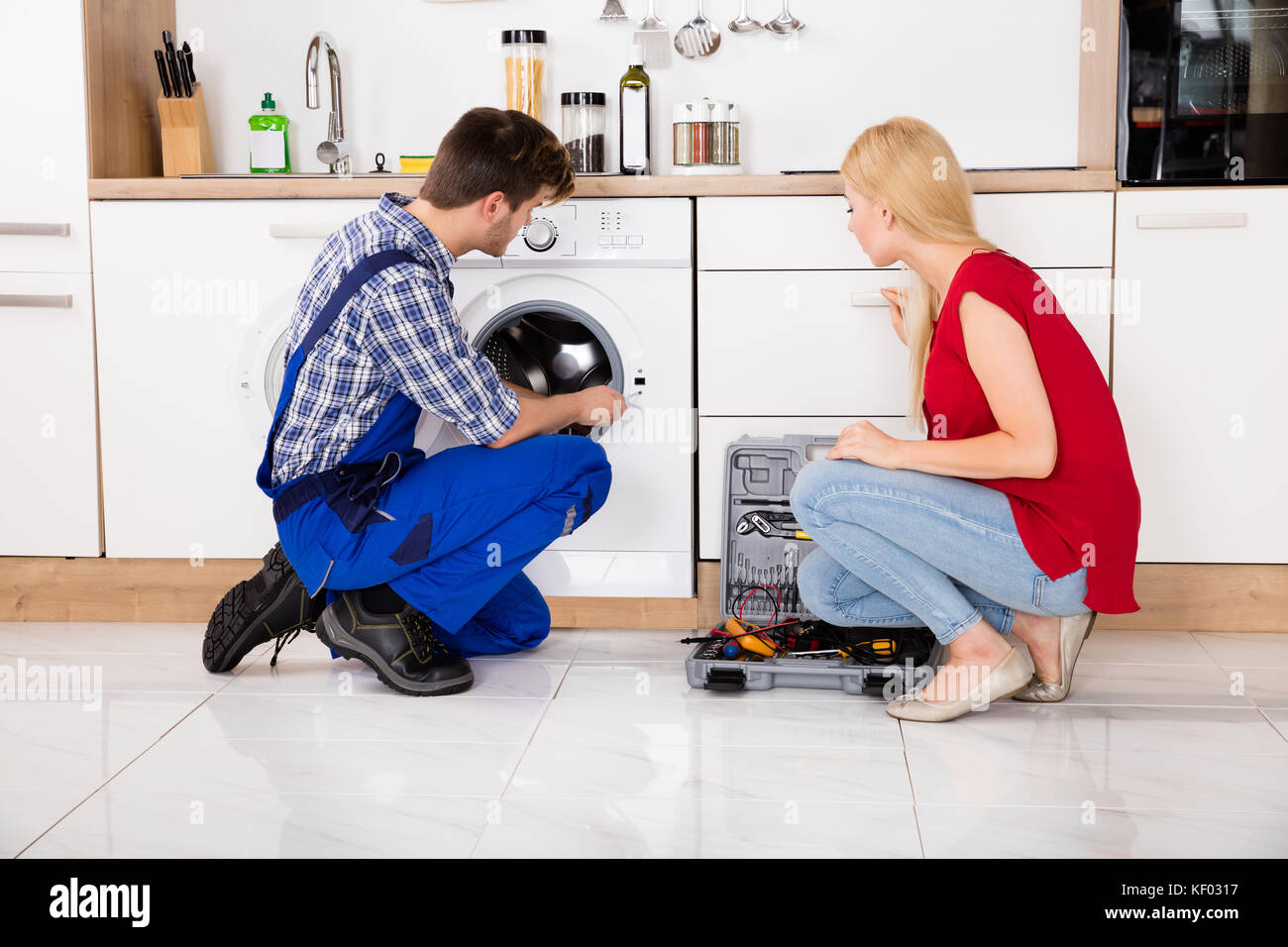 Woman washing machine defect hi-res stock photography and images - Alamy
