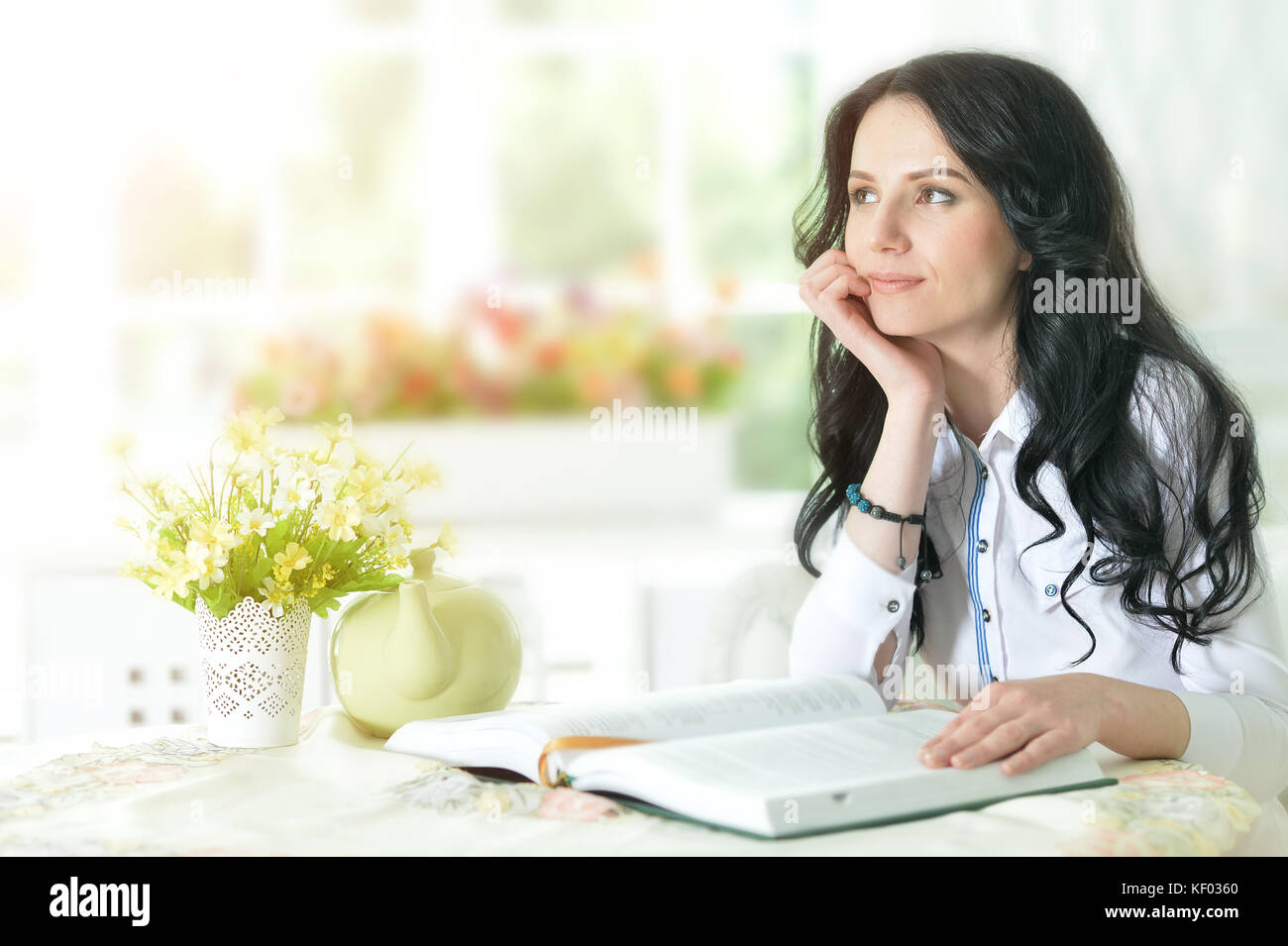 Woman reading interesting book hi-res stock photography and images - Alamy