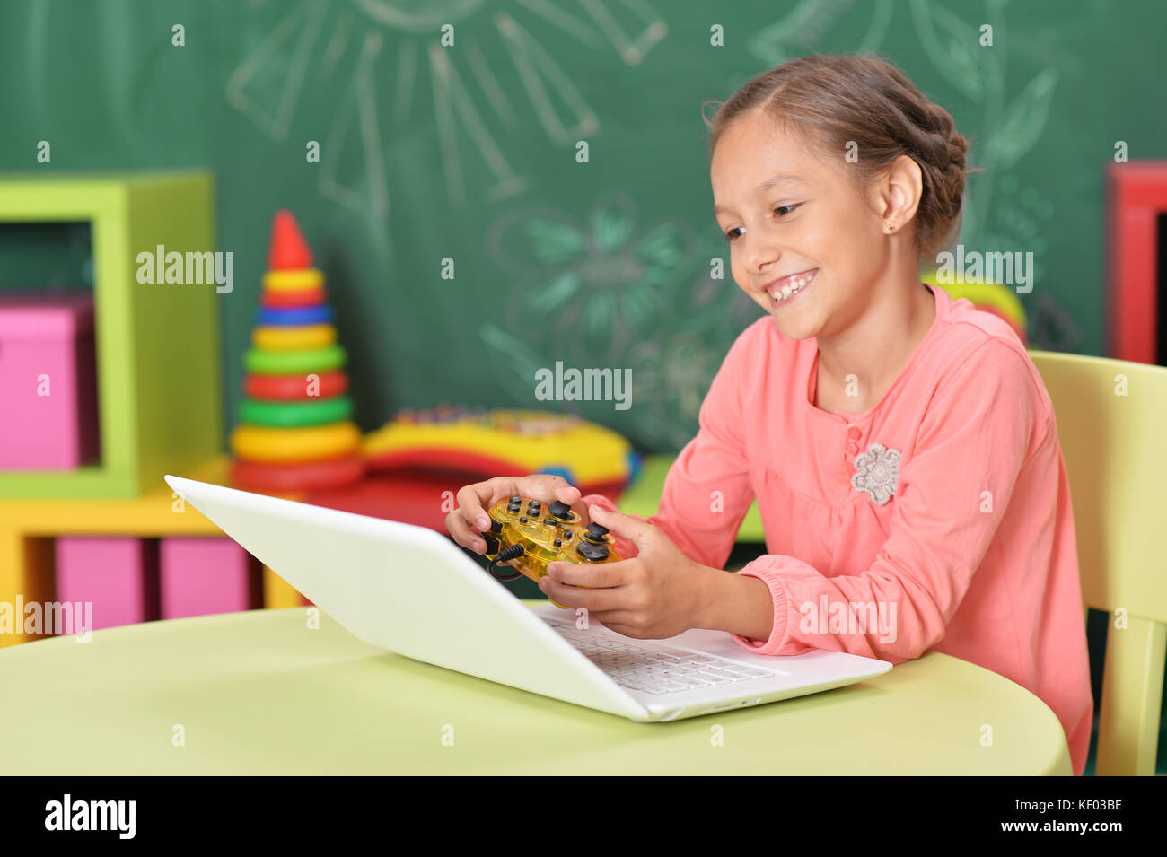 girl playing computer game Stock Photo - Alamy