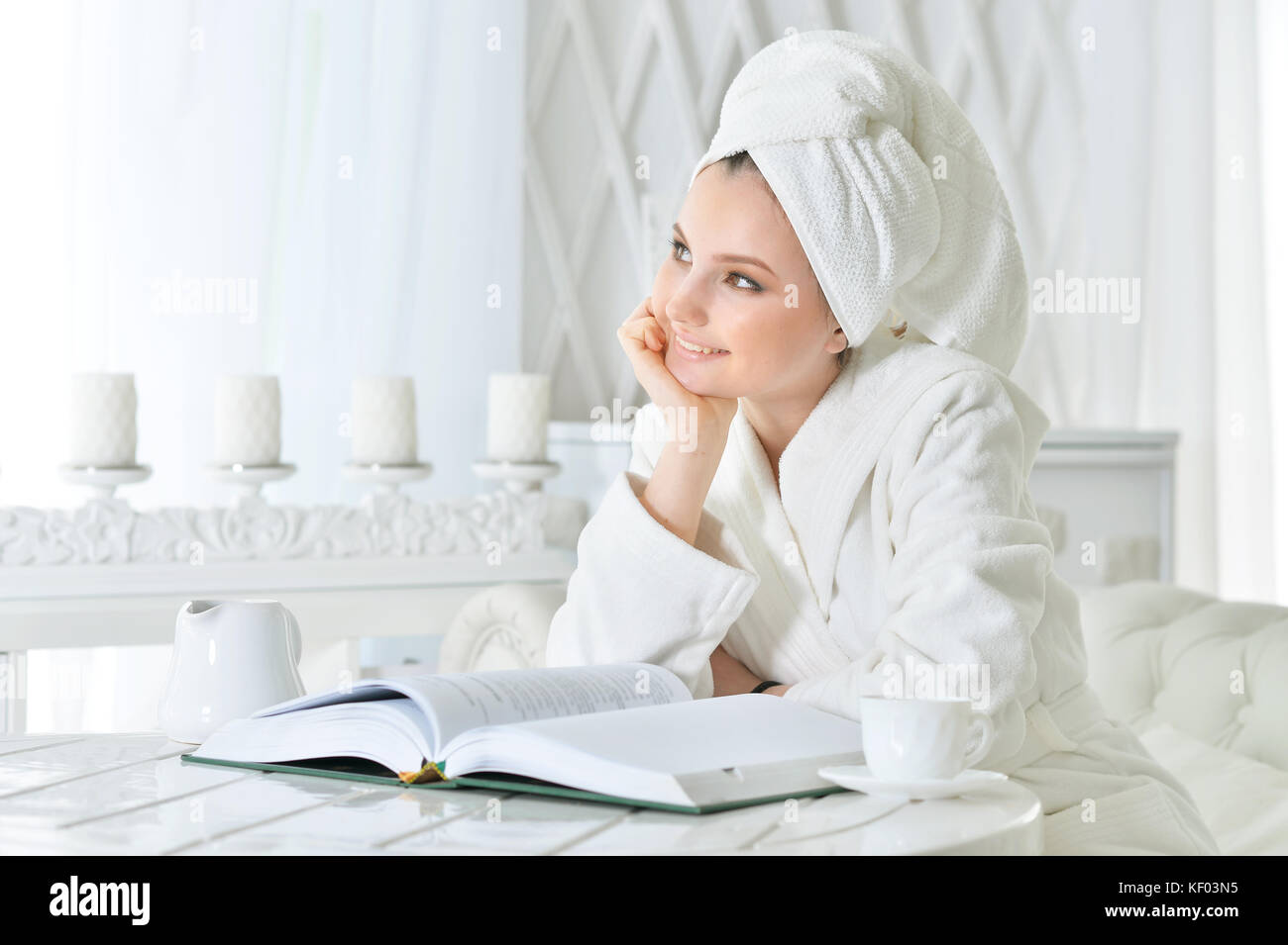 Beautiful happy girl reading book Stock Photo - Alamy