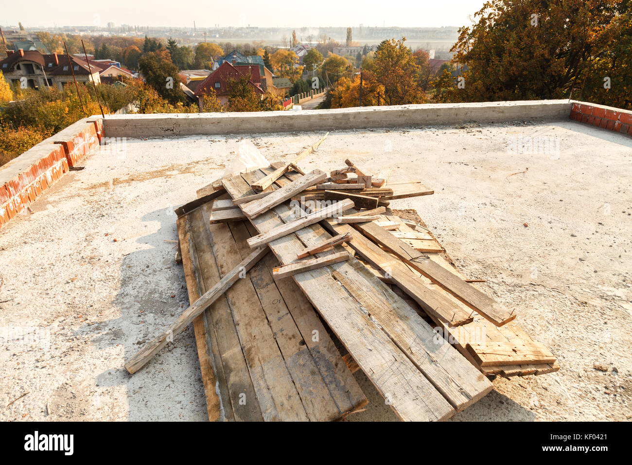 Construction waste on the roof of the house under construction ...